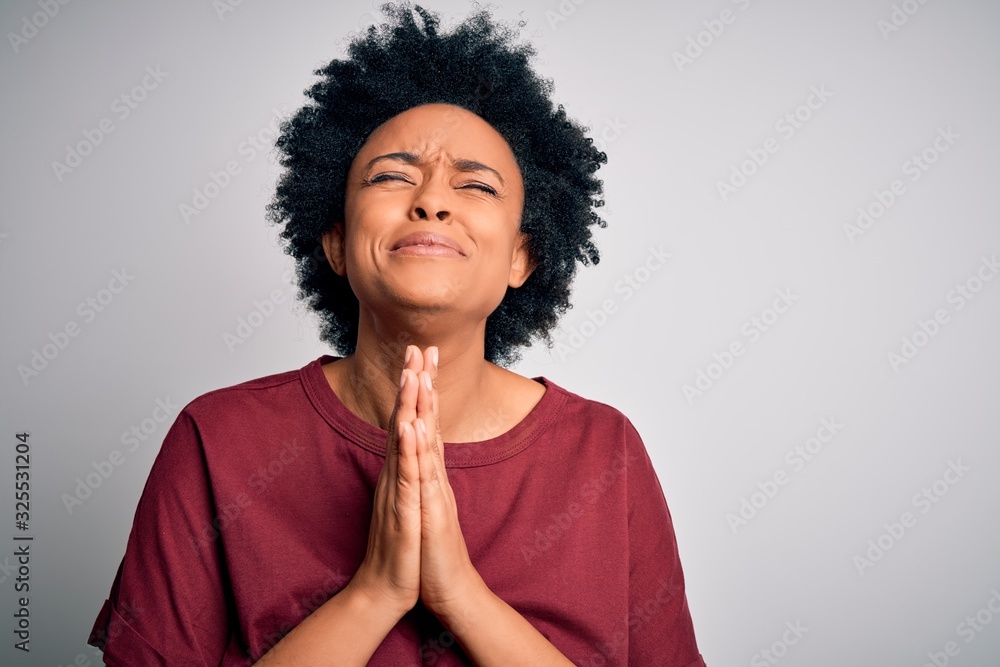 Young beautiful African American afro woman with curly hair wearing ...