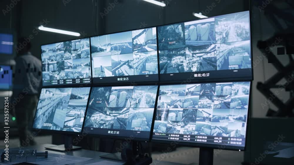 Industry 4.0 Modern Factory: Security Control Room with Multipoke ...