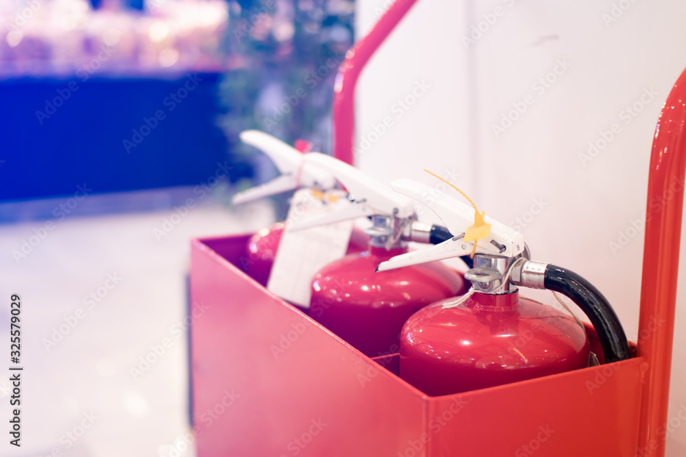 Red tank of fire extinguisher. Overview of a powerful industrial fire ...