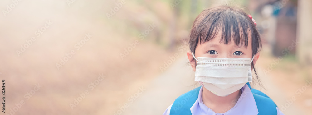 Little school girl has mask protect herself from Corona virus COVID-19 ...