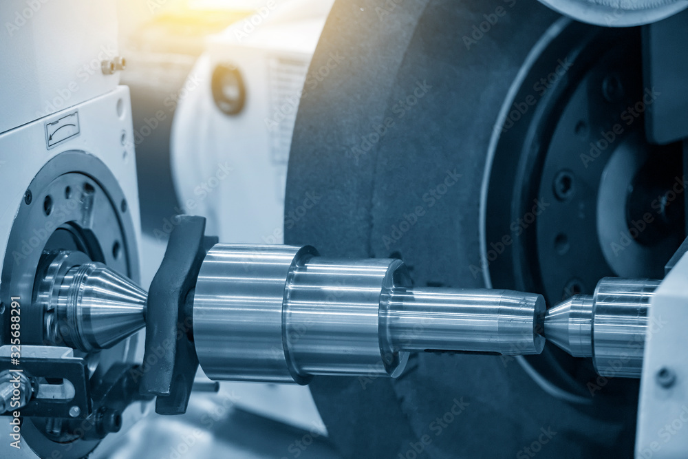 The metal shaft parts on cylindrical grinding machine for surface ...