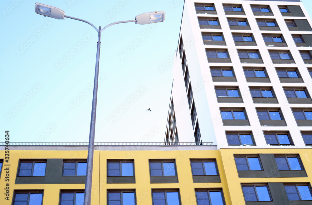 High-rise building in a modern style. Residential, office building in ...