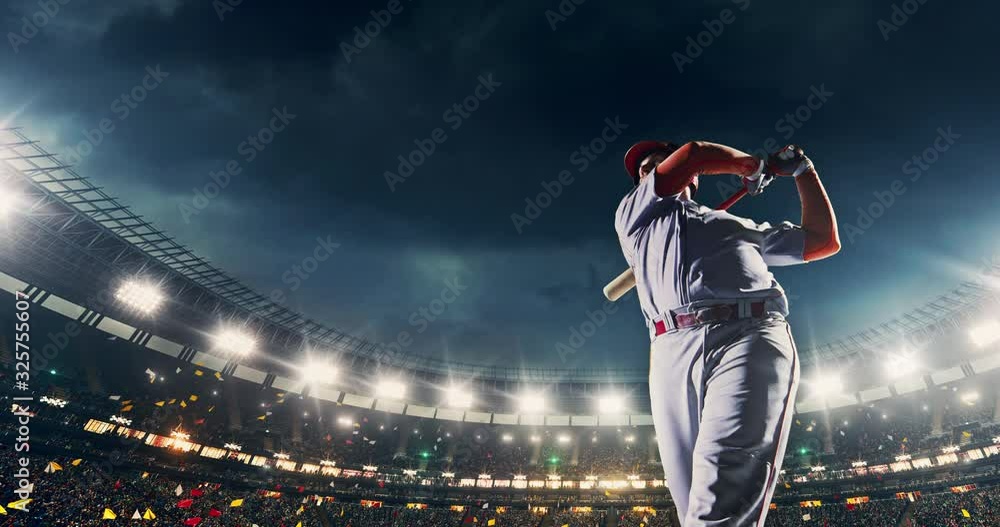 Baseball male player in action during the game on a professional ...