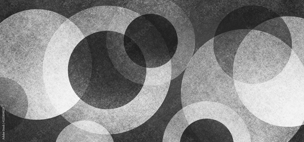Abstract black and white background with texture and layers of rings ...