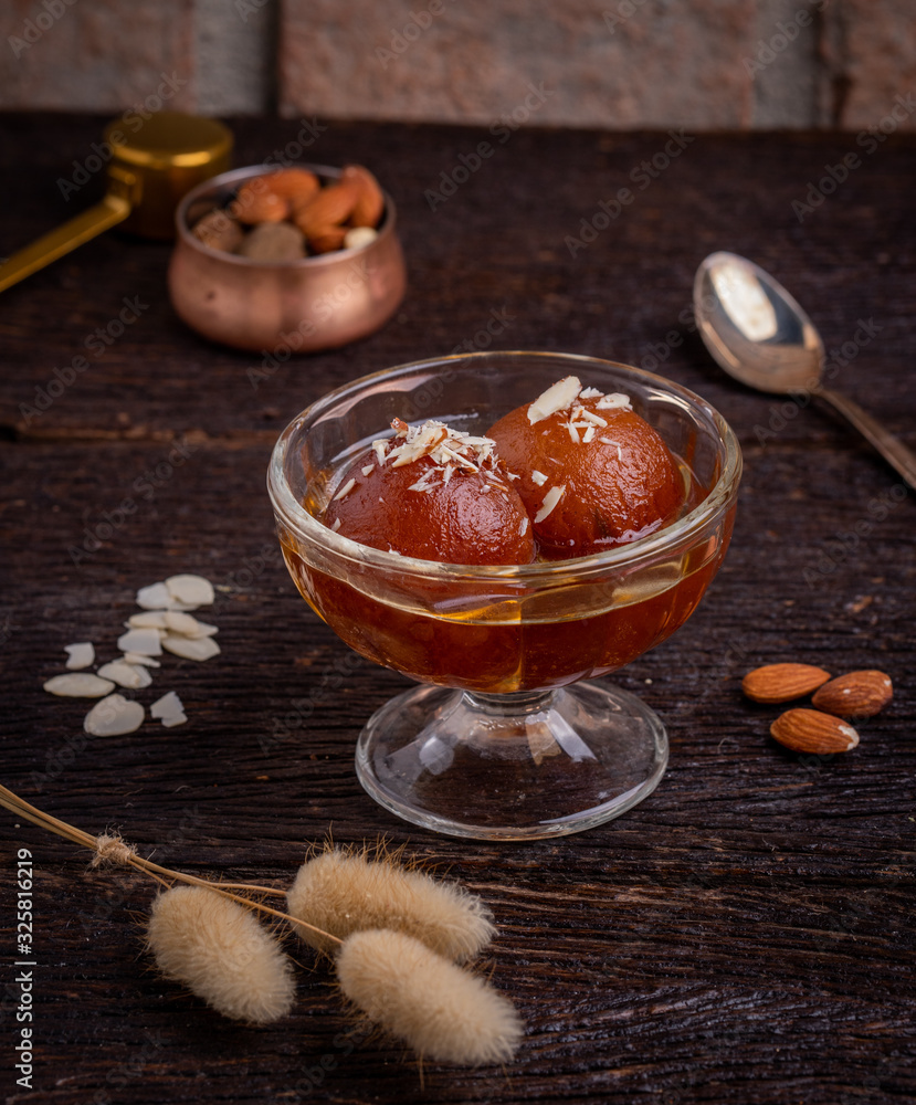 Gulab Jaman in beautiful crystal bowl. Stock Photo | Adobe Stock