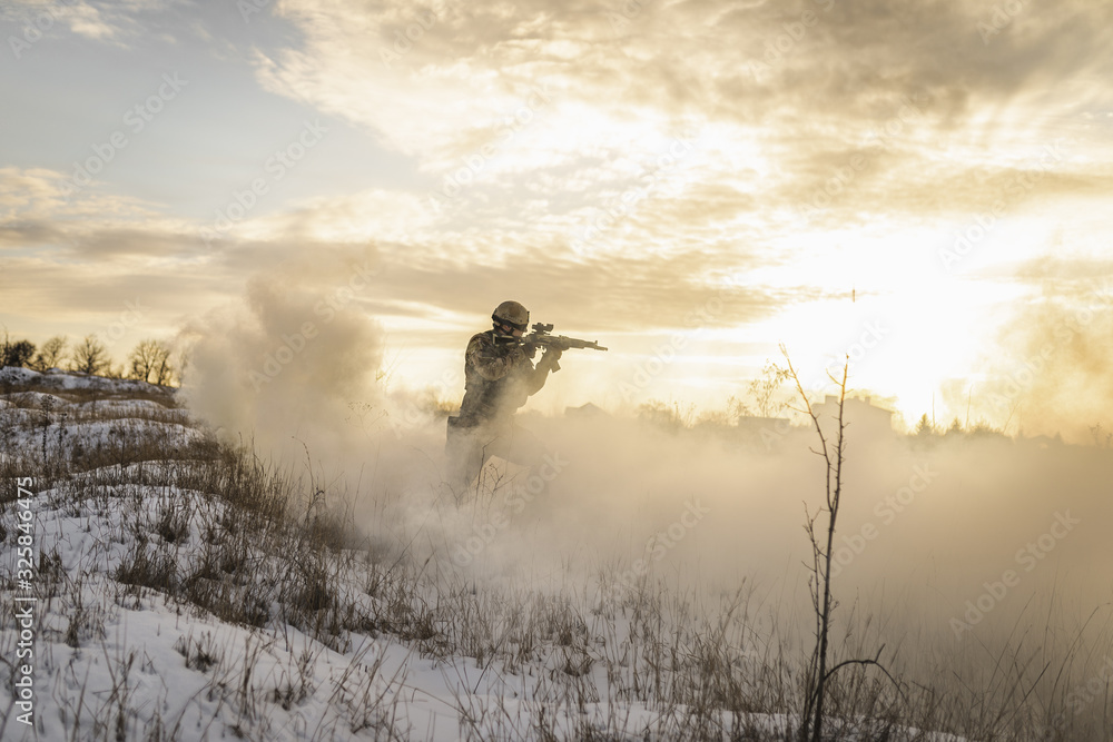 American army soldier under fire area field. skirmish with American ...