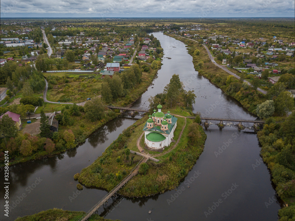 Aerial view of Smolensky Cathedral of Olonets located on a small island ...