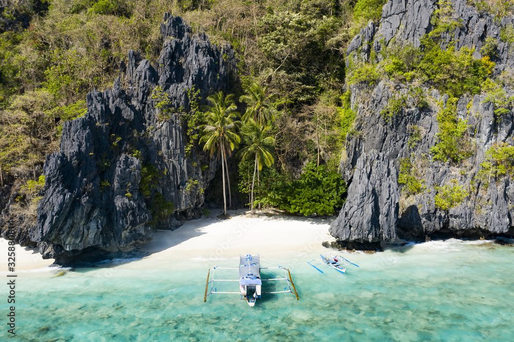 Stunning aerial view the Entalula Beach, a white sand beach surrounded ...