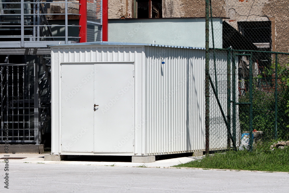 New shipping container converted into storage area with metal locked ...