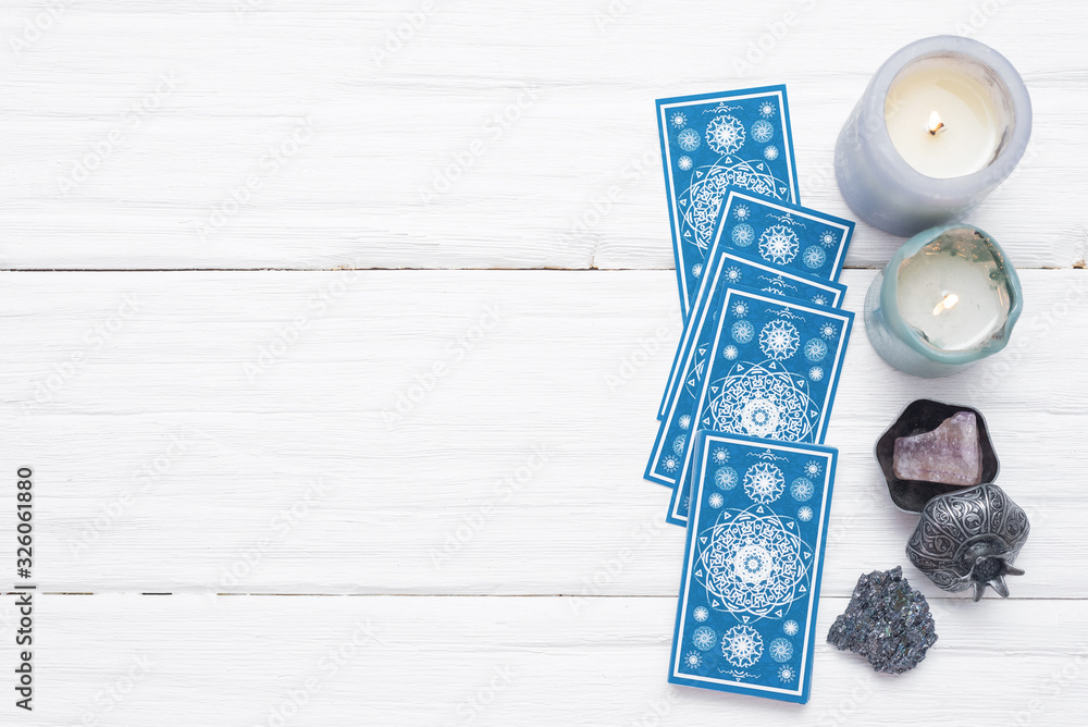 Blue tarot cards on white wooden table background with copy space ...