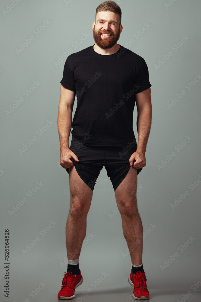 Sportswear concept. Full length portrait of sweet smiling charismatic ...