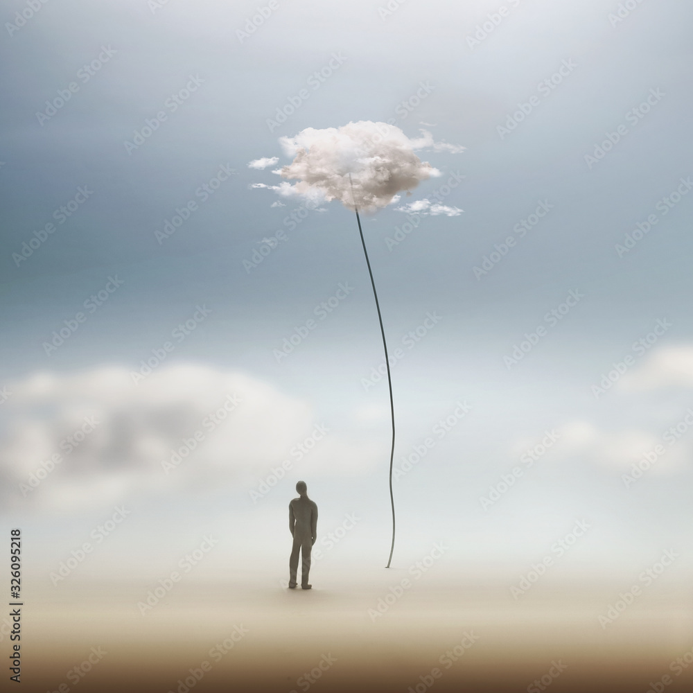 man observes a surreal cloud attached to the ground with a thread Stock ...