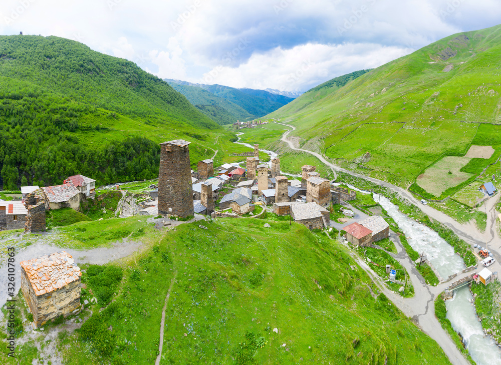 View of the Ushguli village at the foot of Mt. Shkhara. Picturesque and ...