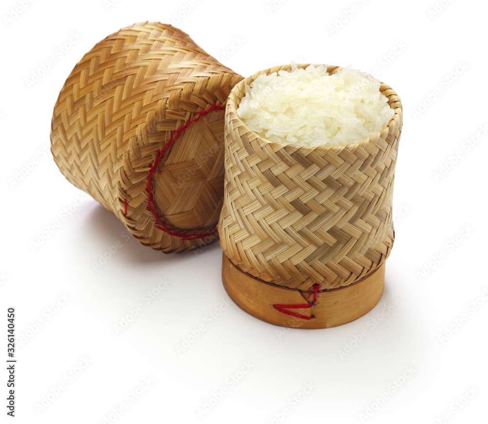 steamed sticky rice is in bamboo container ; thai laos food Stock Photo ...