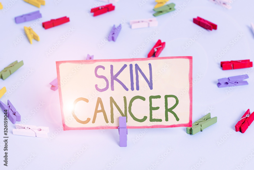 Handwriting text Skin Cancer. Conceptual photo uncontrolled growth of ...
