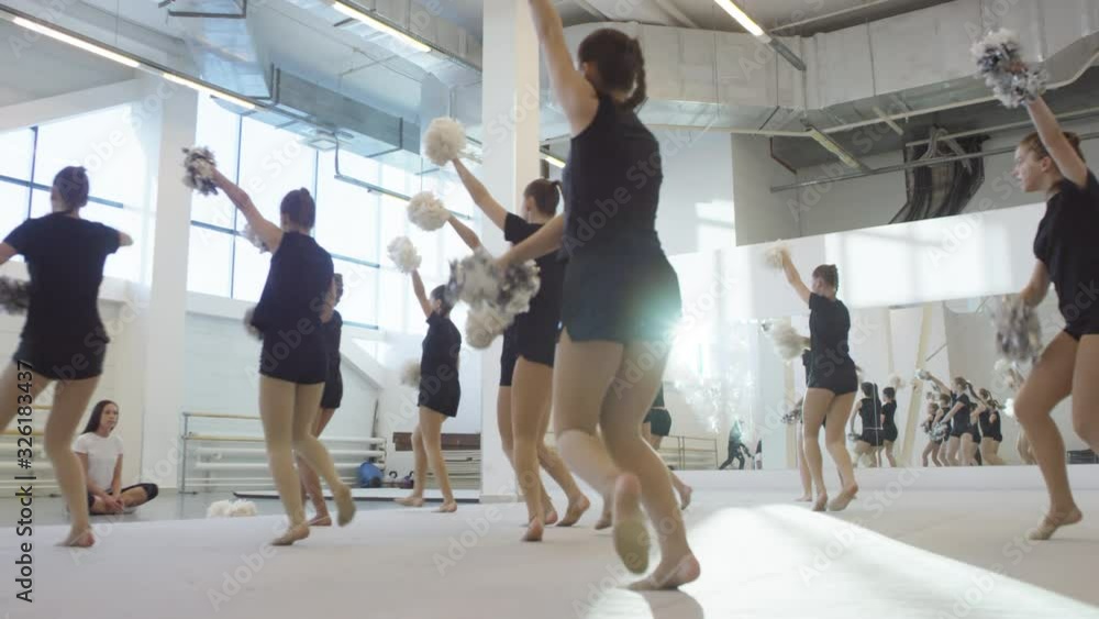 Vidéo Stock Low angle shot with slowmo of team of teen and preteen ...