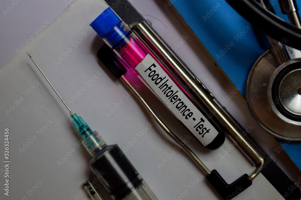 Food Intolerance - Test with blood sample. Top view isolated on office ...