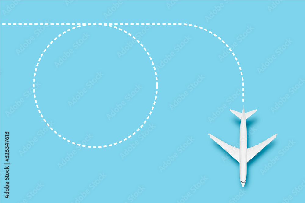 Airplane and line indicating the route on a blue background. Concept ...