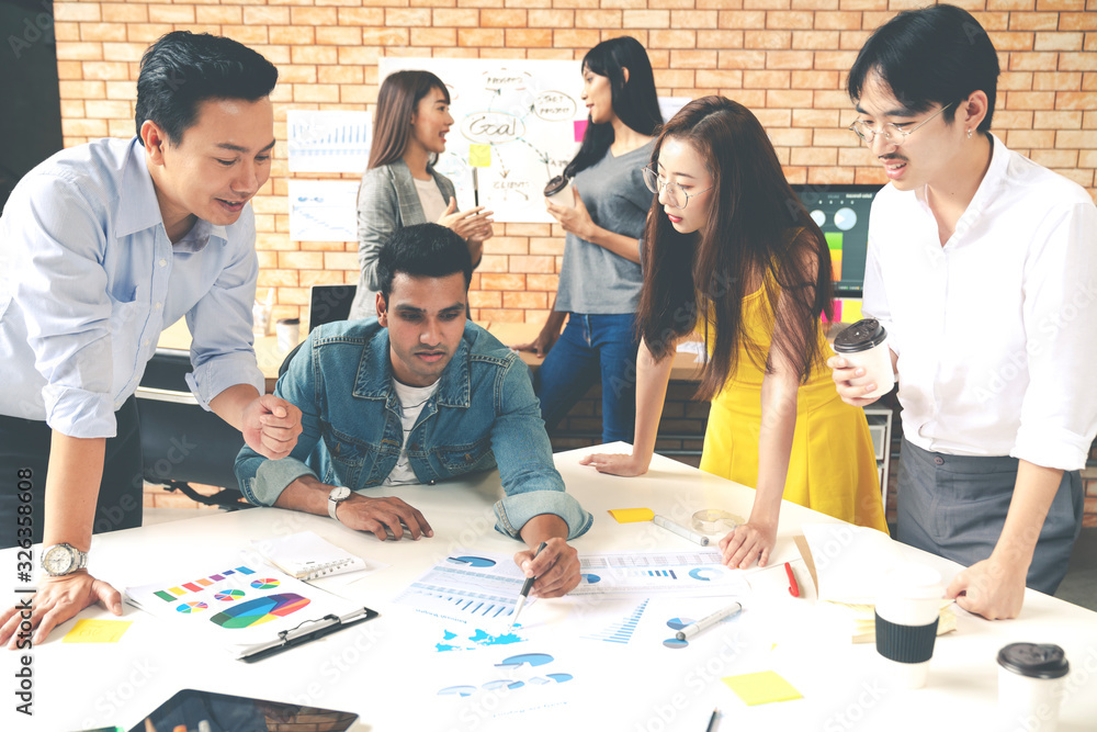 Asian business employee team brainstorming and workshop at meeting room ...