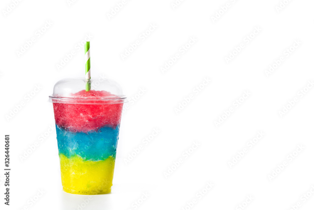 Colorful slushie of differents flavors with straw in plastic cup ...