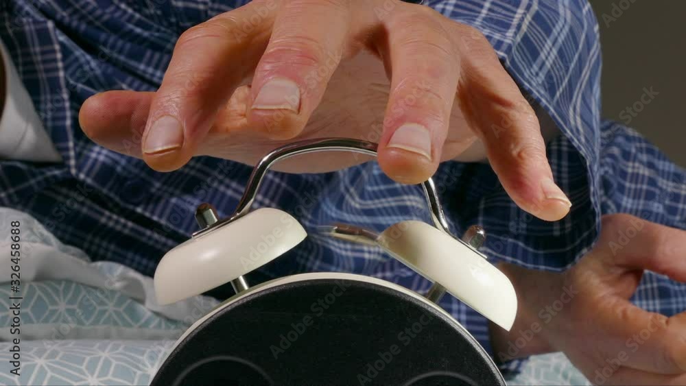 Cinemagraph – Video of a ringing traditional bell alarm clock, with a ...