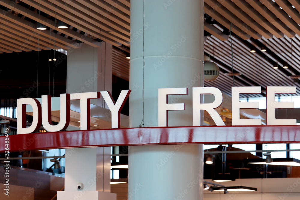 Duty free sign in the airport building. The tax-free area symbol Stock ...