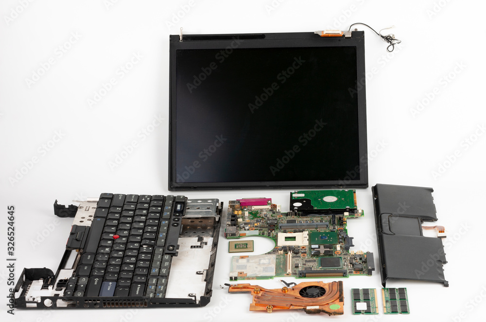 Disassembled laptop, basic components of notebook, screen, keyboard ...