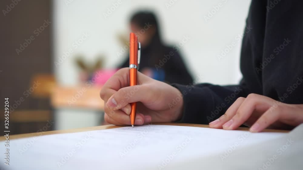 Student hand testing doing test exam with pencil drawing selected ...