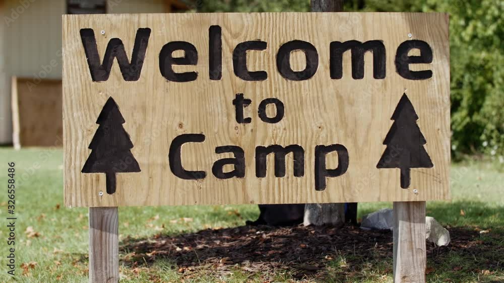Welcome to Camp Sign at Entrance to Summer Camp Stock ビデオ | Adobe Stock
