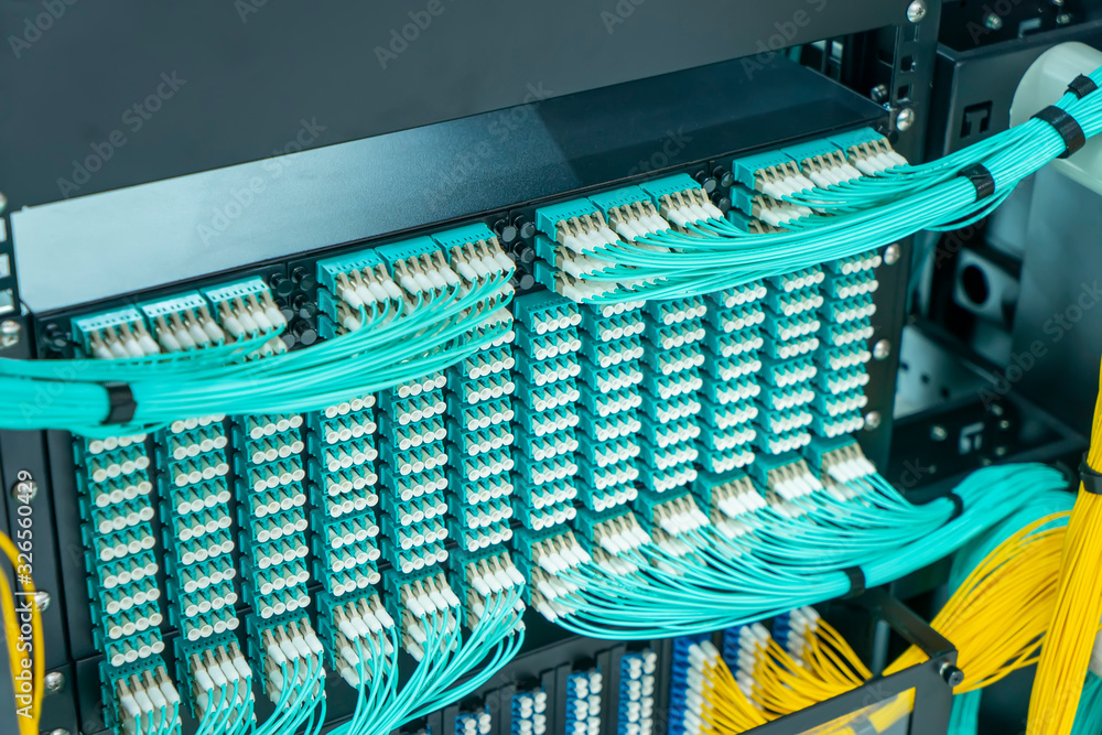 Fiber optic cable connect to communication Distribution point Stock ...