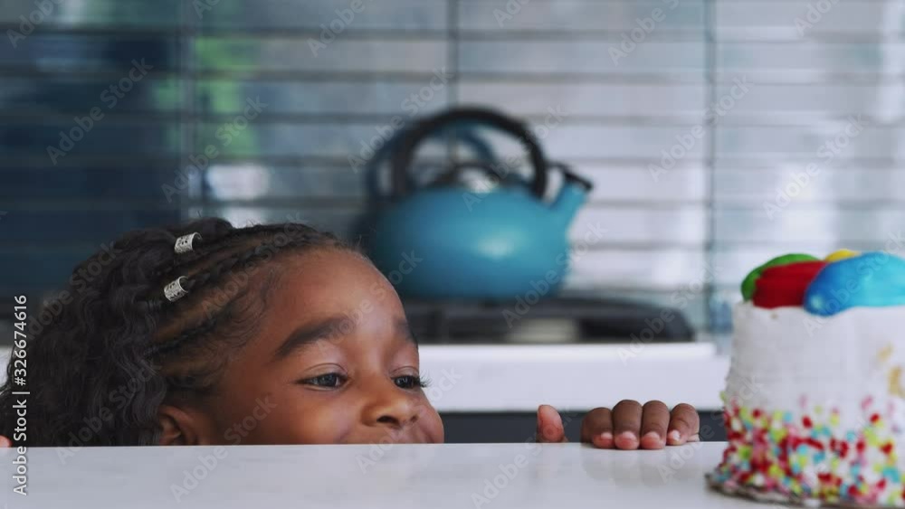 Girl Hiding Behind Kitchen Counter Takes Sneaky Look At Birthday Cake ...