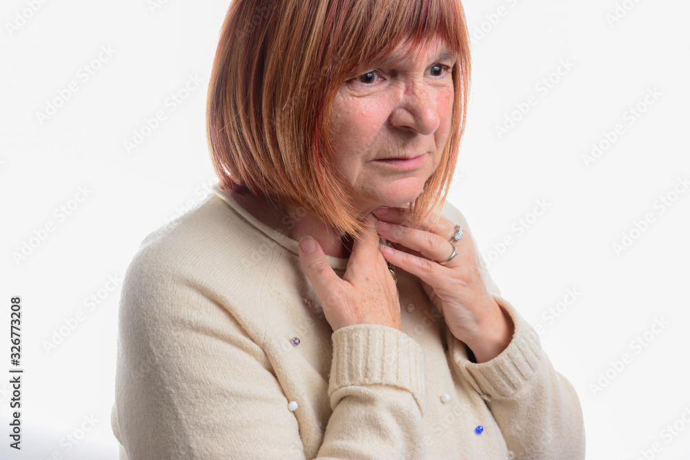 Senior lady sweeping the laryngeal, laryngitis, goiter or ...