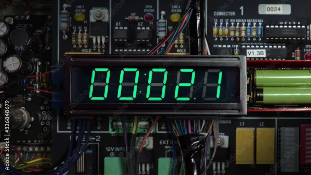 Bomb detonator 7 seconds count with digital green numbers. Slow zoom in ...