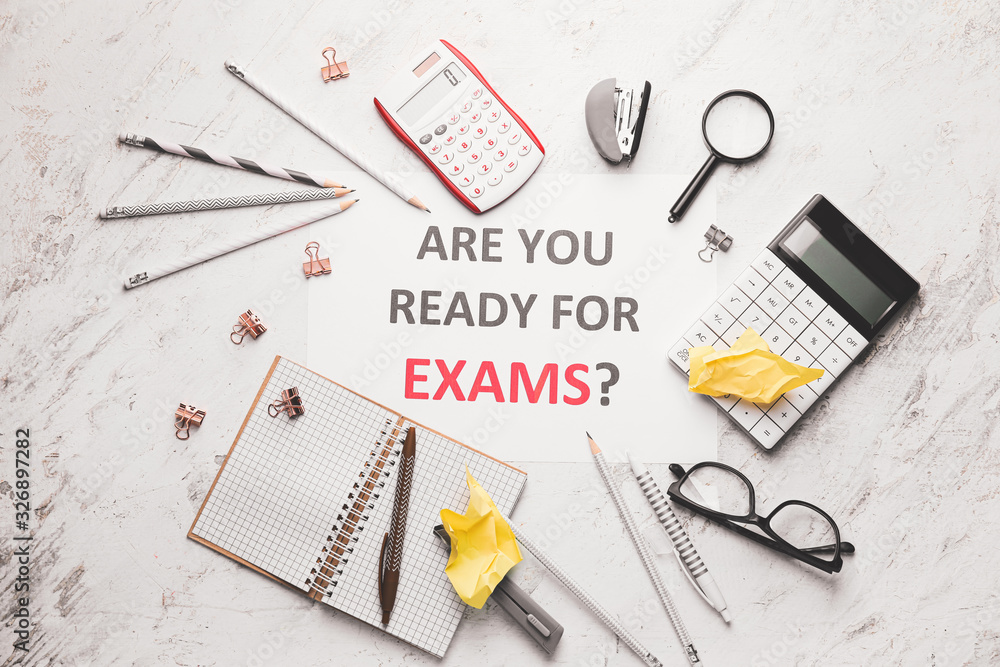 Stationery and paper sheet with text ARE YOU READY FOR EXAMS? on white ...
