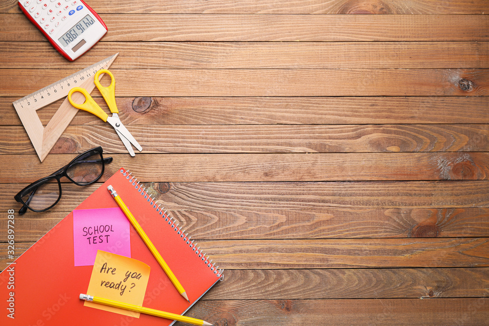 Stationery on wooden background. Concept of preparation for exam Stock ...