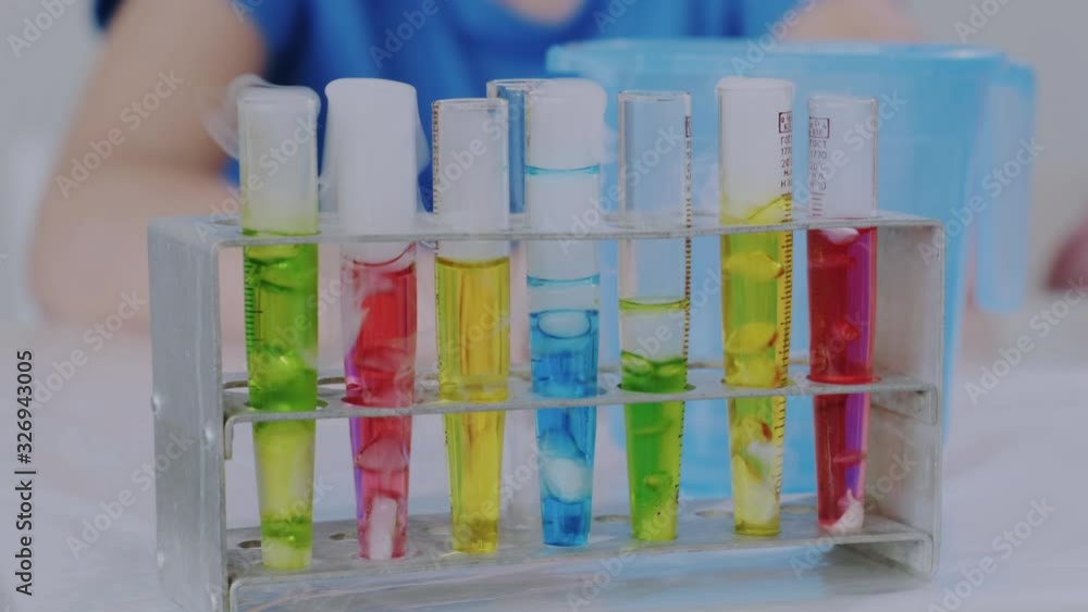 Closeup shoot of Medical Tests Tubes. Colourful Liquid Boiling and ...