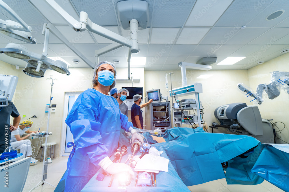 Surgical room in hospital with robotic technology equipment, machine ...