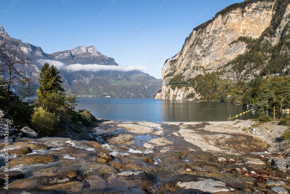 FLUELEN, SWITZERLAND - OCTOBER 31, 2017: The lake Urnersee is a part of ...