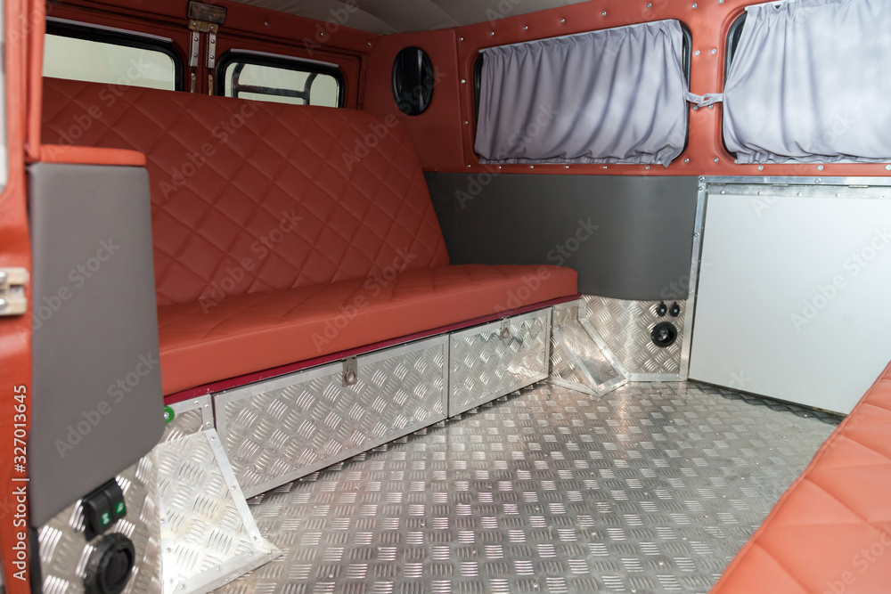 The interior of the car in the back of a van converted into a motor ...