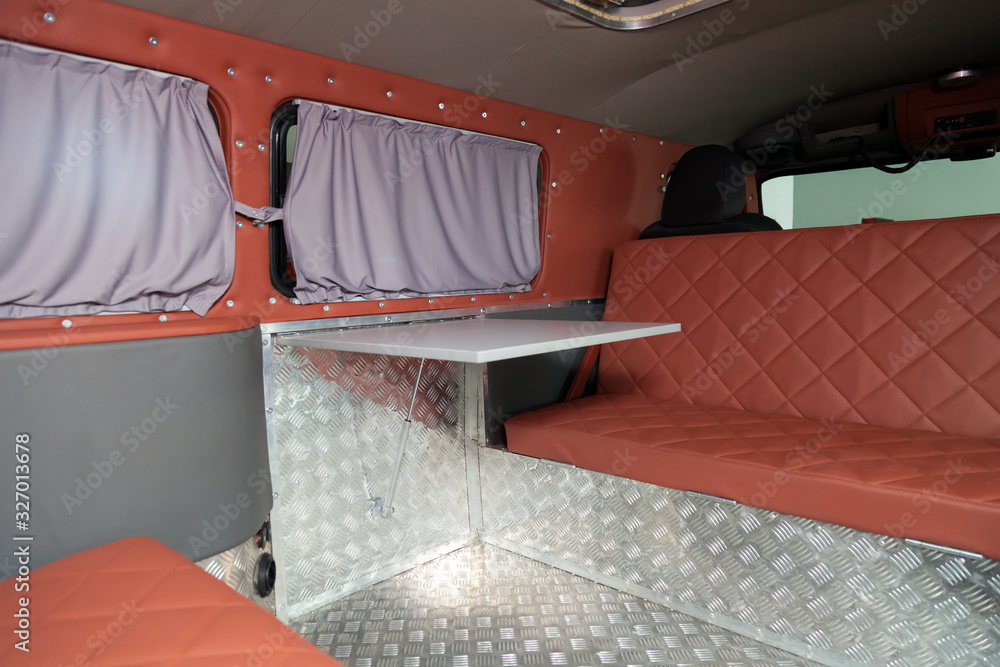 The interior of the car in the back of a van converted into a motor ...