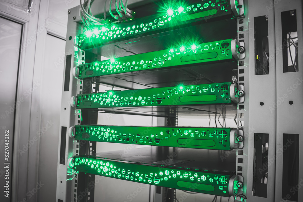 Powerful multimedia servers work in a data center rack. File-based ...