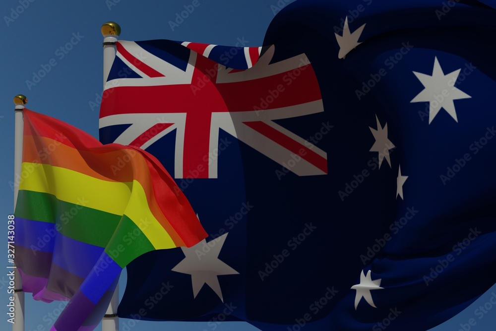 LGBT flag and Australian flag on a pole waving in the wind together ...