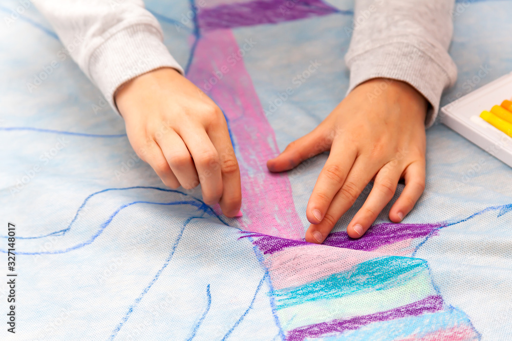 Simple kids hands drawing with precision on a huge canvas using oil ...