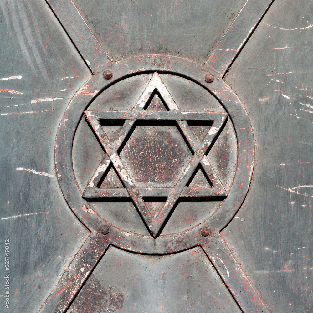 Star of David, old damaged metal door architectural building part ...