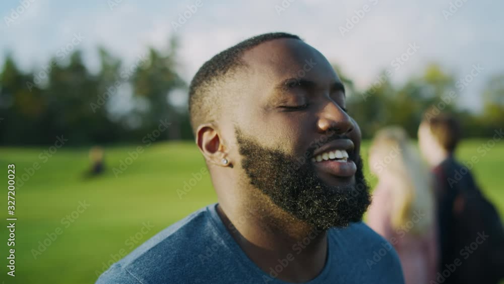 Exhausted man doing cardio workout on road. Athlete running marathon in ...