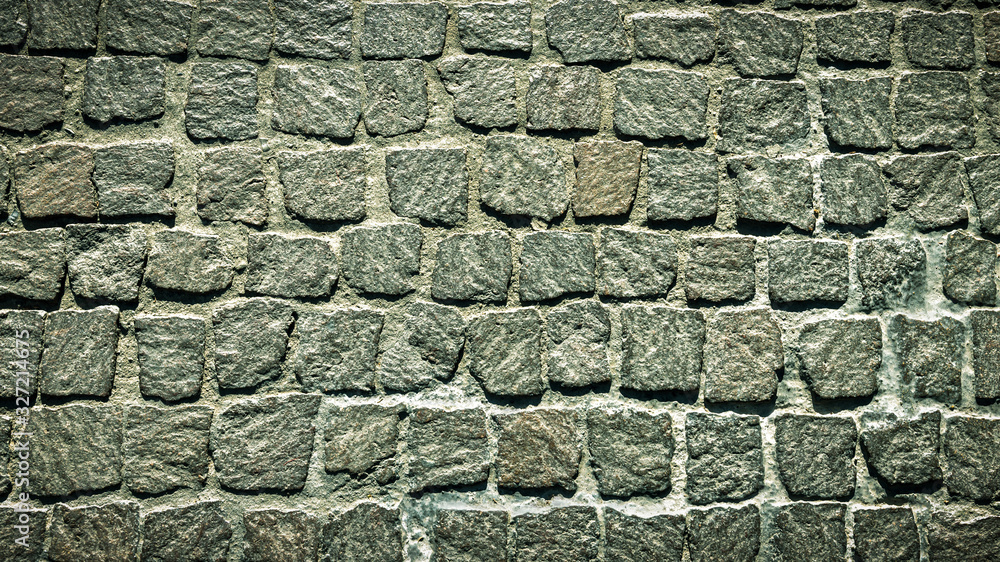 Cobblestone pavement texture background. Top view of stone road. Detail ...