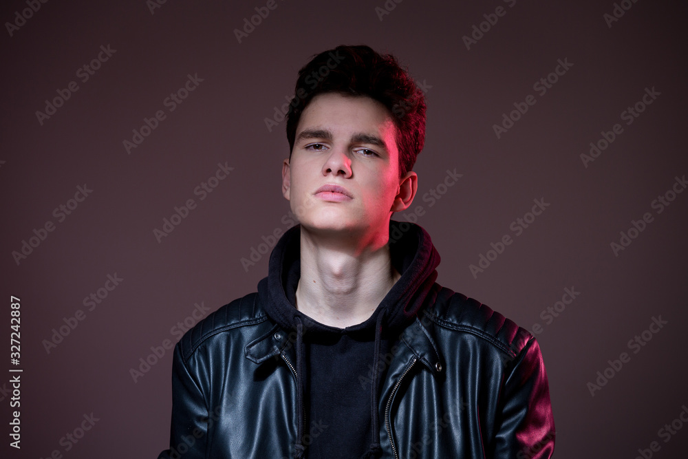 Attractive young guy posing in studio. Young caucasian guy model in ...