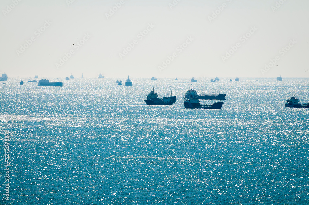 Offshore view of traffic jam of tanker ships crowding the horizon on ...