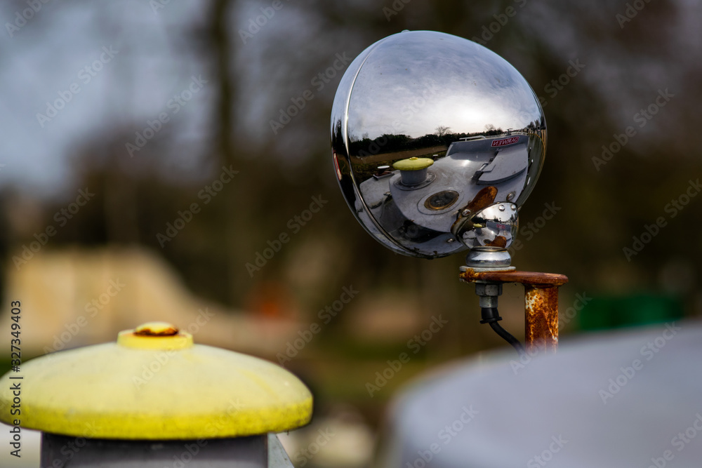 Reflection of the whole boat in the boat lamp, reflector gives sharp ...
