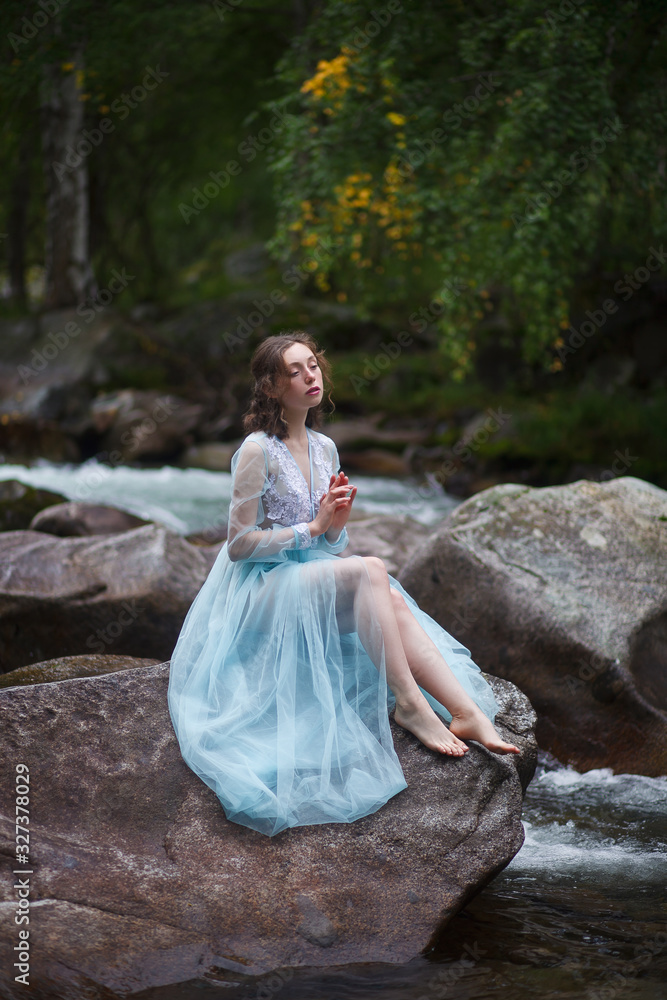 The Tale of the Mermaid. Tale of the River Nymph. Girl in a blue dress ...